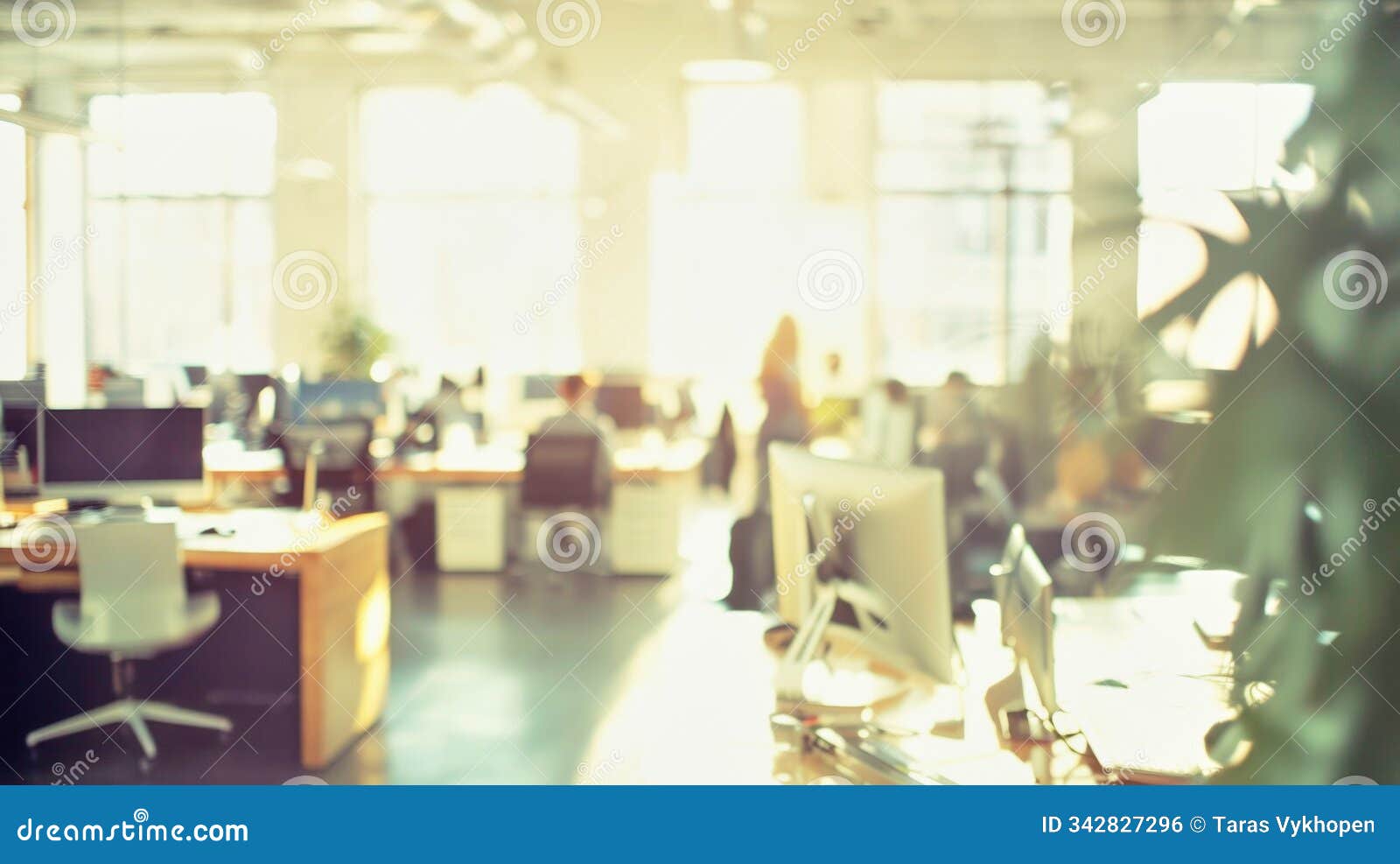 Contemporary Office Layout in Daylight Showcasing Busy Desks with ...