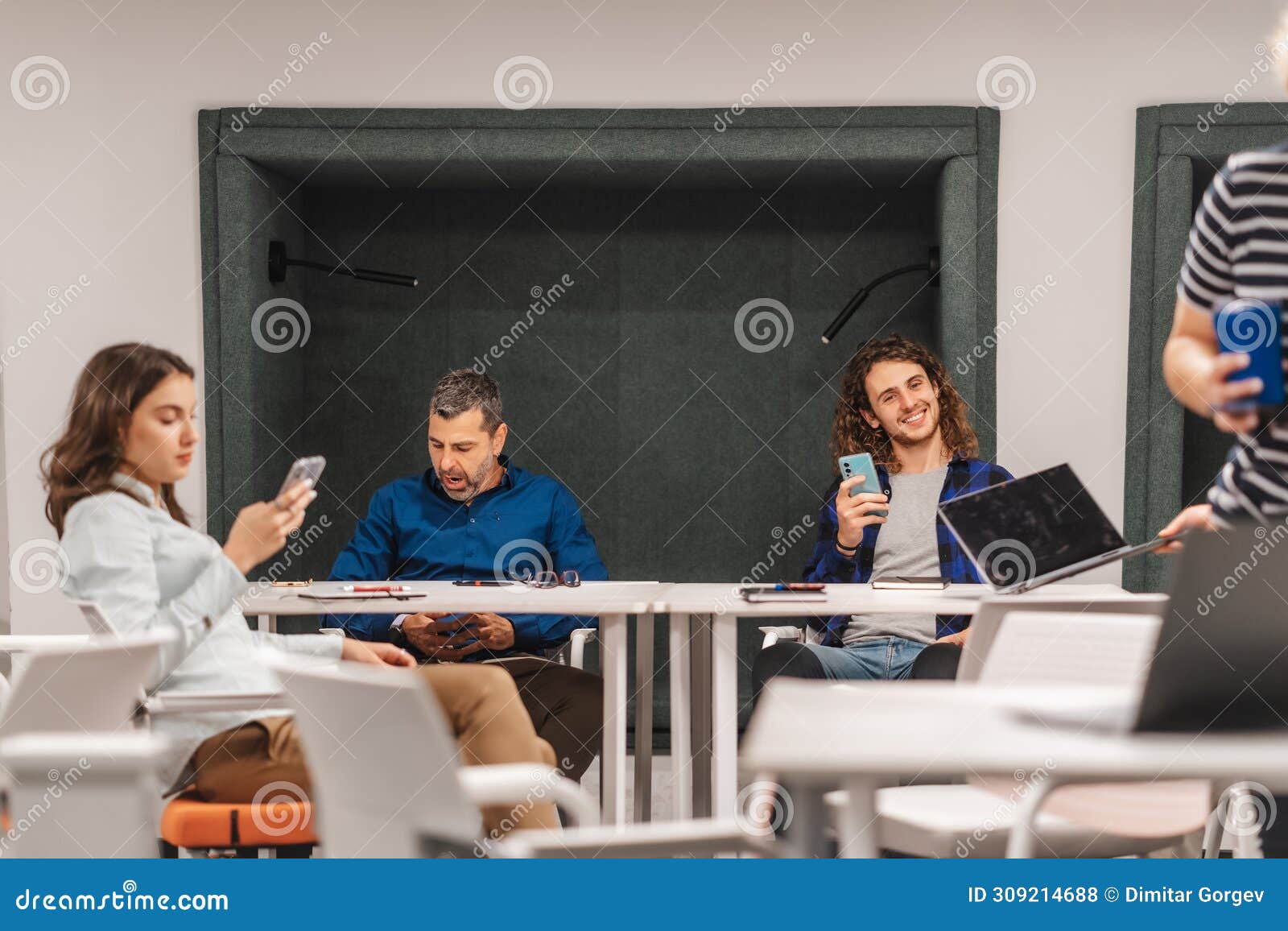 Contemporary Office Setting with Diverse, Inter Generational Team ...