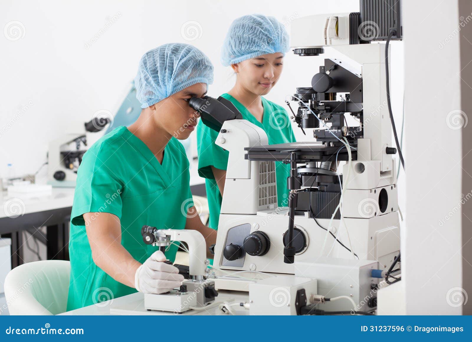 Contemporary researchers stock photo. Image of microscope - 31237596