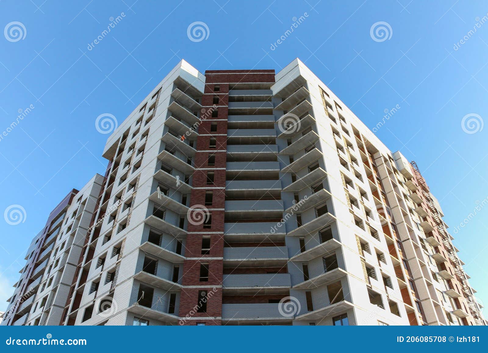 Facade of a Multi-storey Building Under Construction. Brick Building ...