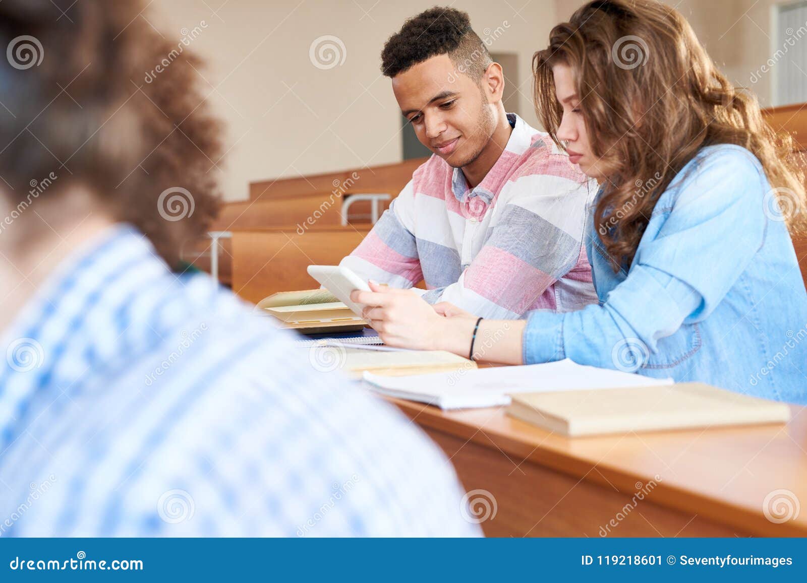 Multiethnic Students Watching Video on Gadget Stock Image - Image of ...