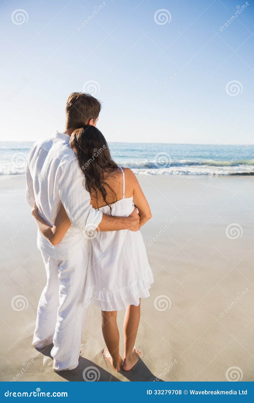 Content Couple Looking at the Waves Stock Photo - Image of glamour ...