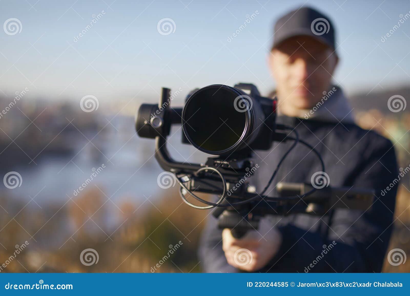 Content Creator during Filming with Camera and Gimbal Stock Image ...