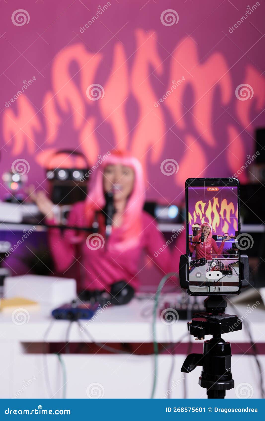 Content Creator Sitting at Desk Table Talking into Microphone with ...