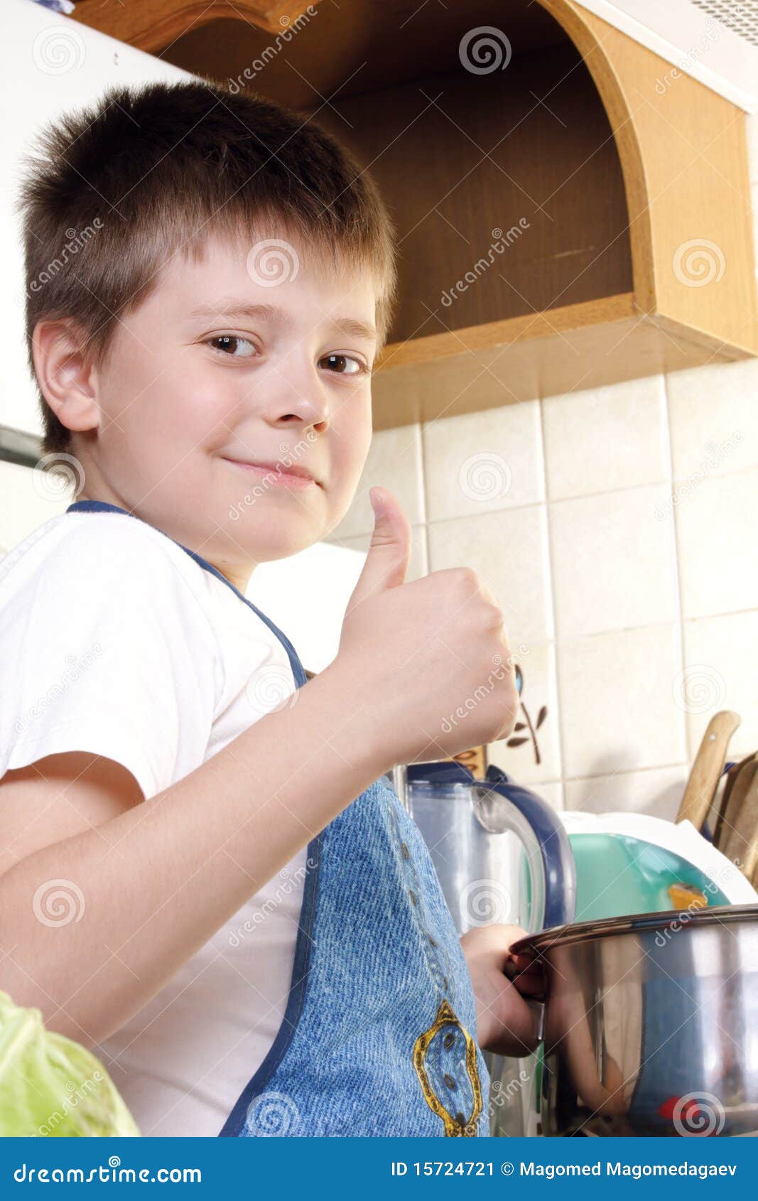 Contented boy at kitchen stock image. Image of indoors - 15724721