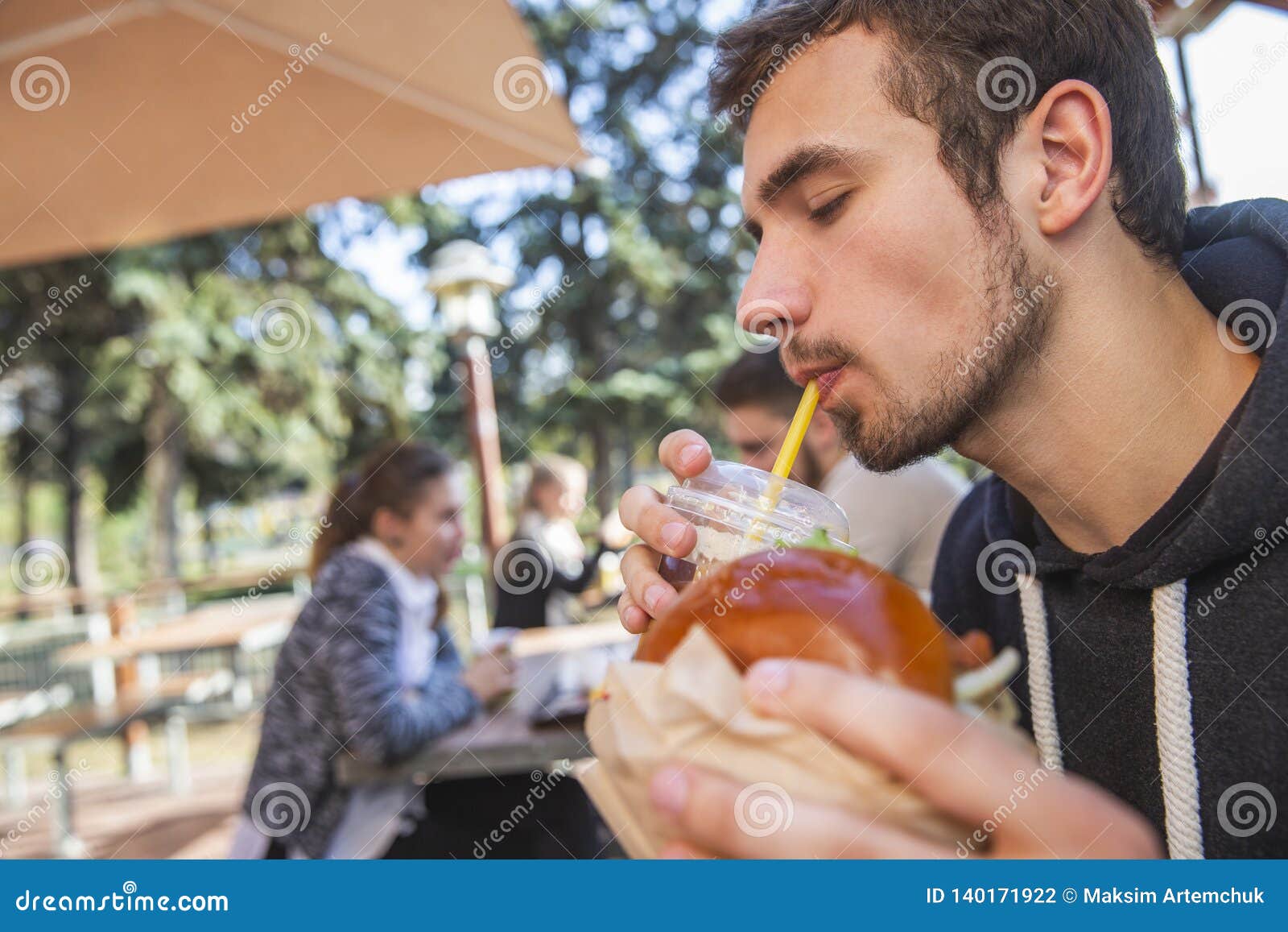 Contented Guy is Drinking His Fruit Juice, His Eyes are Closed. he is ...