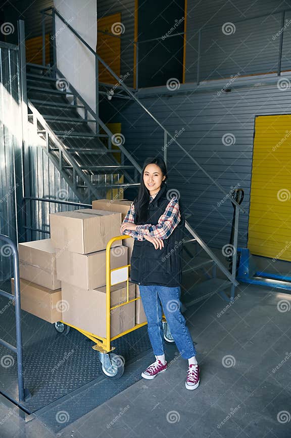 Contented Warehouse Loader Posing for Camera during Cargo Unloading ...