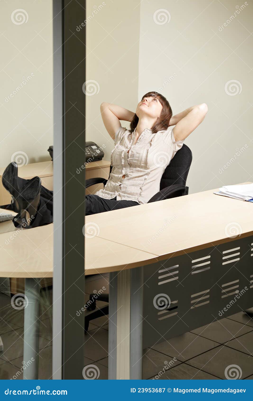 Contented woman in office stock image. Image of female - 23953687
