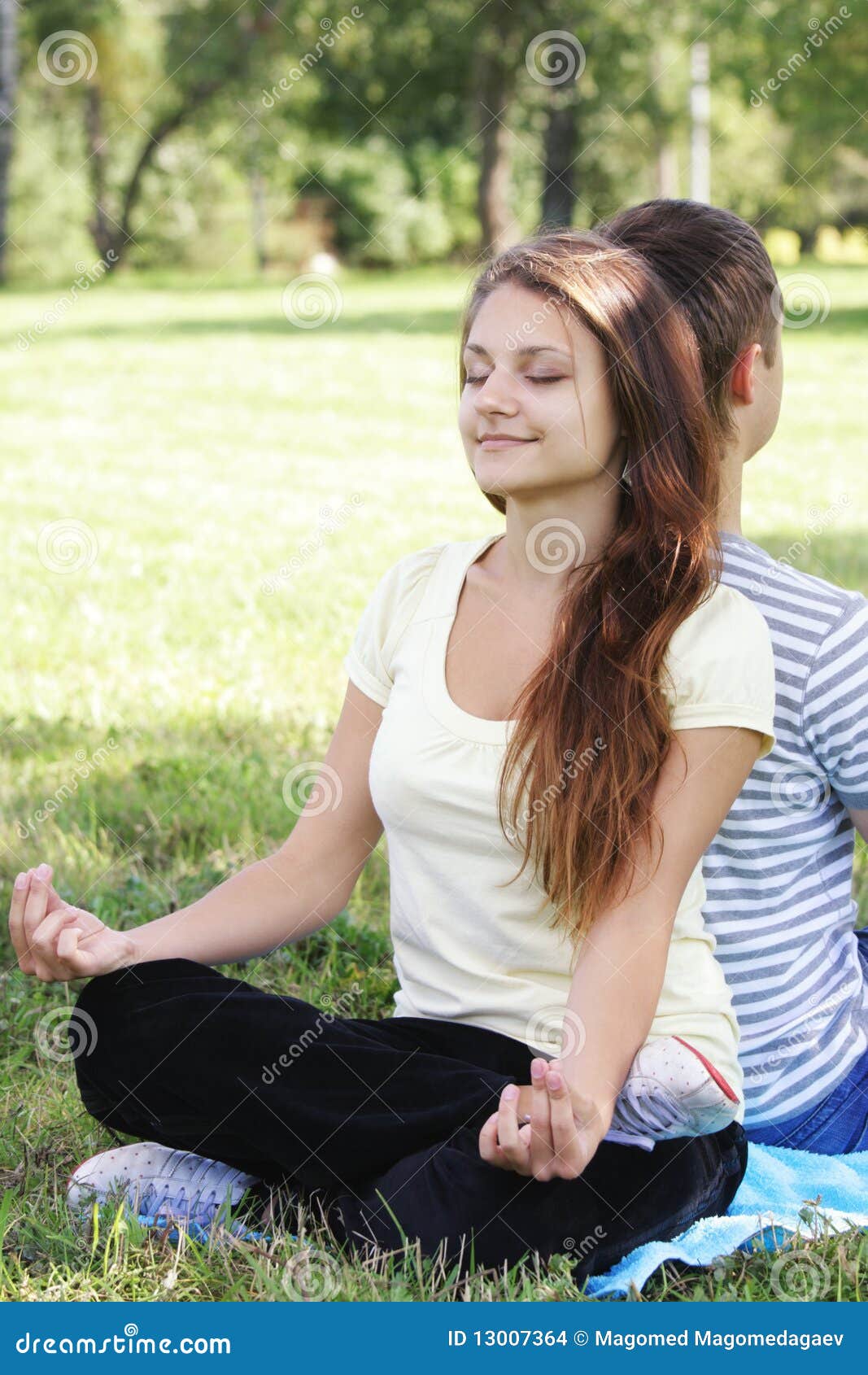 Contented Woman Relaxing in Yoga Pose Stock Photo - Image of sunlight ...