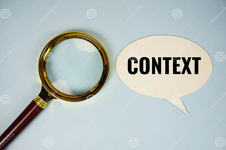 Context Text on Speech Bubble with Magnifying Glass Top View on Blue ...