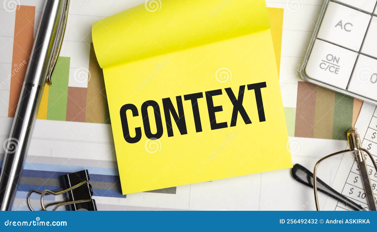 Context Text on the Yellow Paper with Pen and Glasses Stock Photo ...