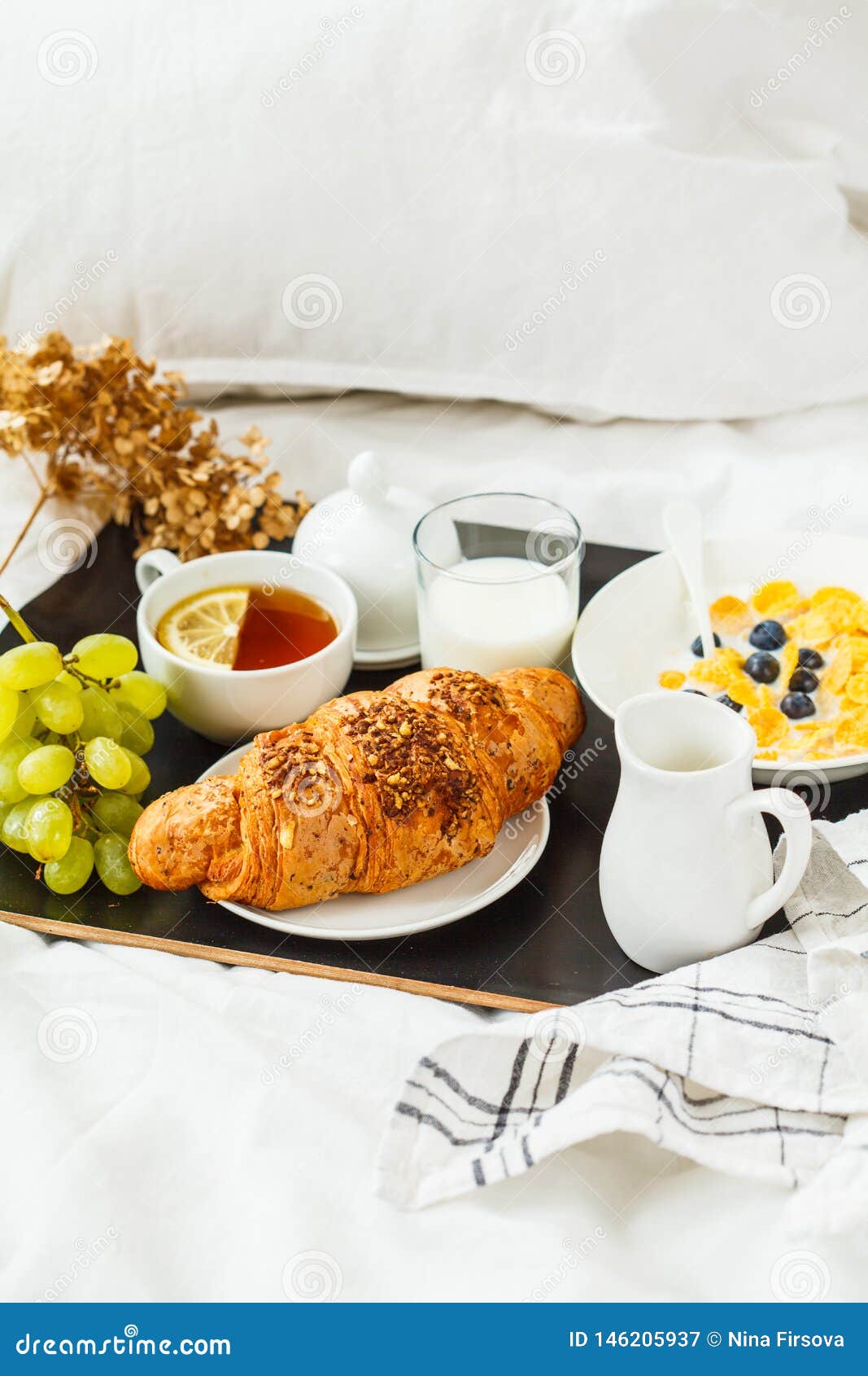 Continental Breakfast in Bed. Croissant, Cornflakes, Tea, Milk and ...