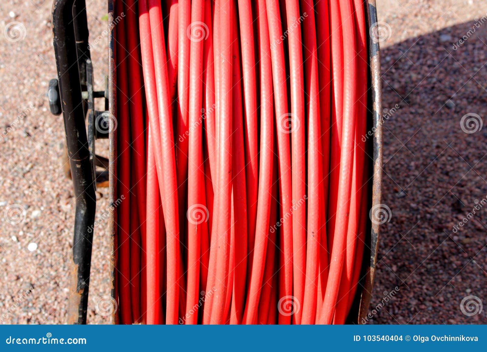 A Continuous Coil of Red Thick Cable on the Coil. Stock Photo - Image ...