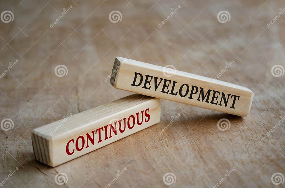 Continuous Development Text on Wooden Blocks. Development Concept Stock ...