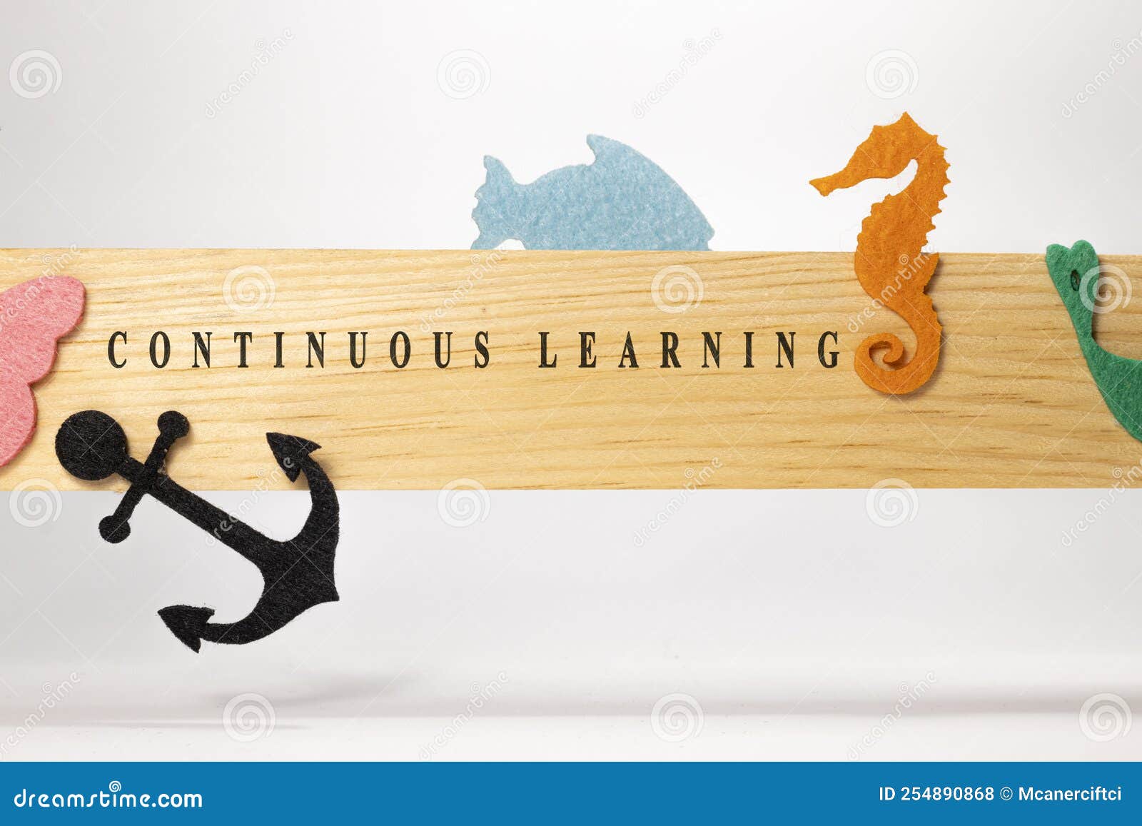 Continuous Learning Written on Wooden Patterned Surface. Education and ...