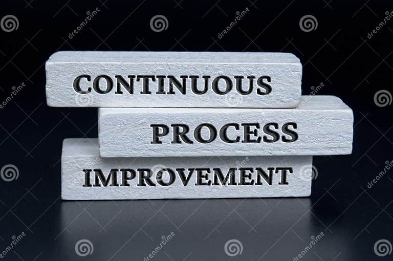 Continuous Process Improvement Text on White Wooden Blocks. Continuous ...