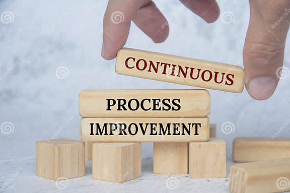 Continuous Process Improvement Text on Wooden Blocks. Continuous ...