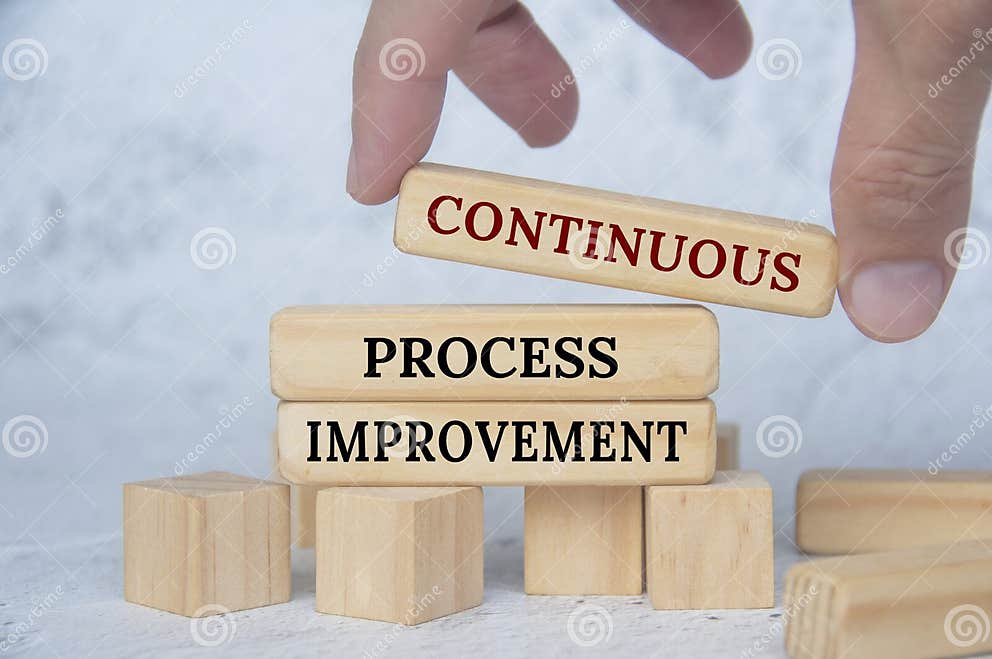 Continuous Process Improvement Text on Wooden Blocks. Continuous ...