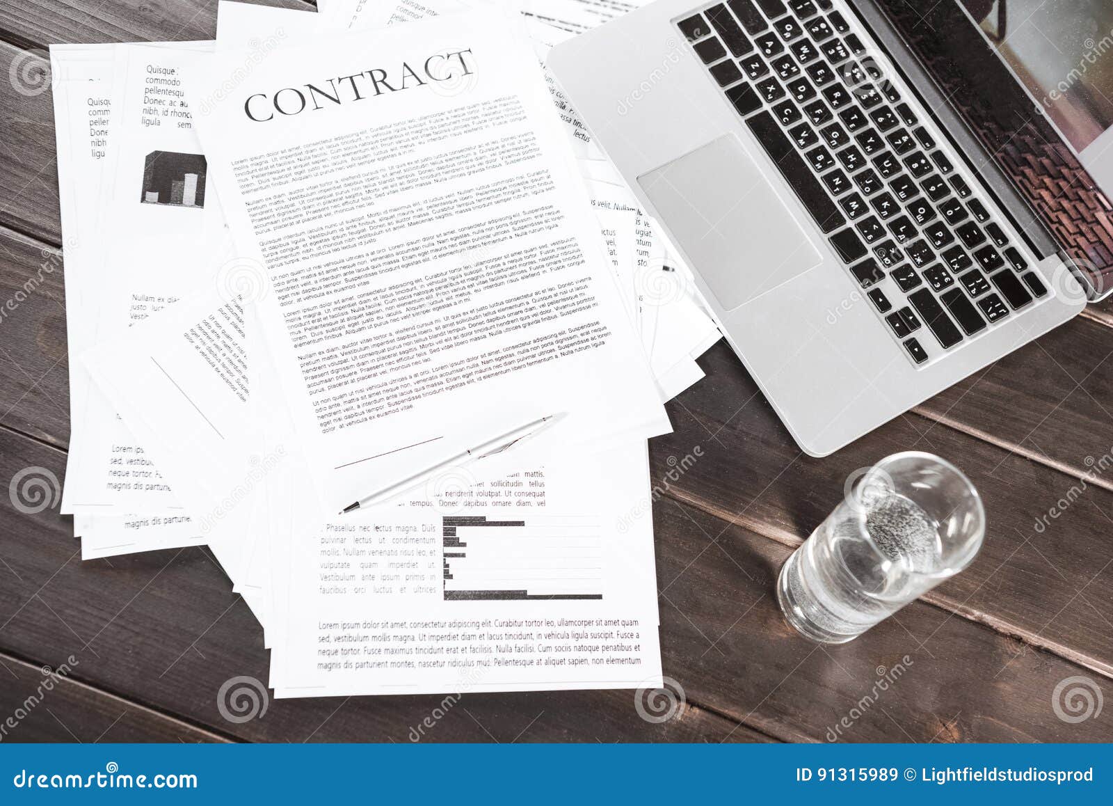 Contract Documents and Laptop Computer on Wooden Tabletop Stock Image ...