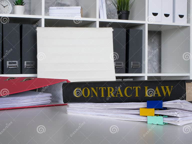Contract Law Book on a Stack of Papers. Stock Image - Image of check ...