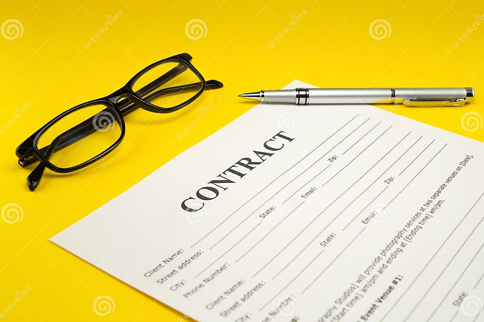 The Contract for the Yellow Table and Pen Stock Photo - Image of desk ...