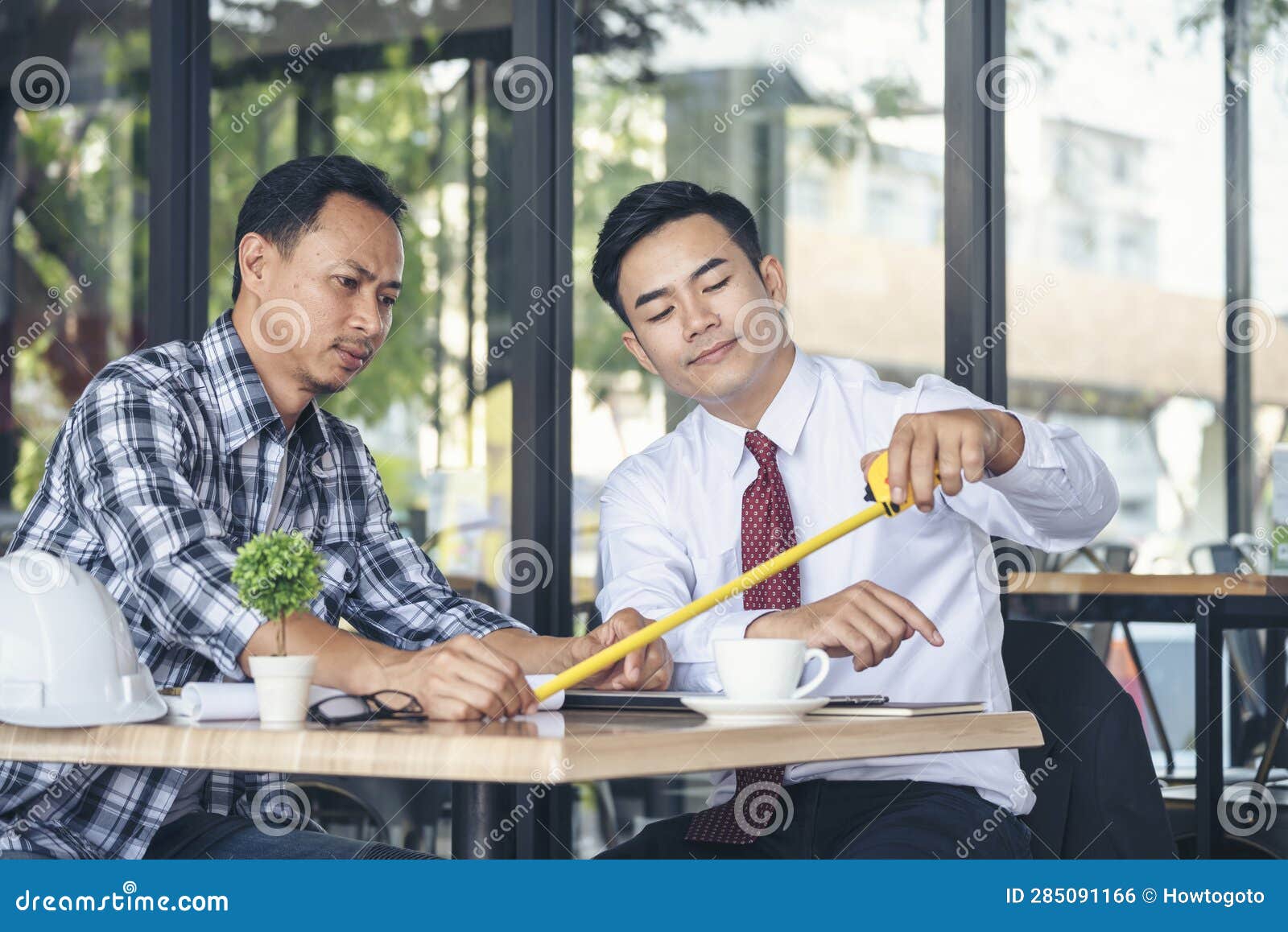 Contractor Construction Engineer Meeting Together on Architect Table at ...