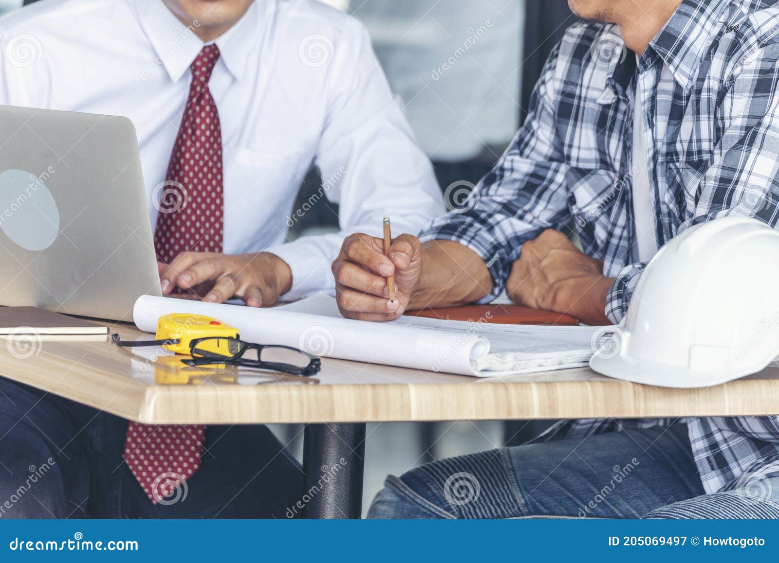 Contractor Construction Engineer Meeting Together on Architect Table at ...