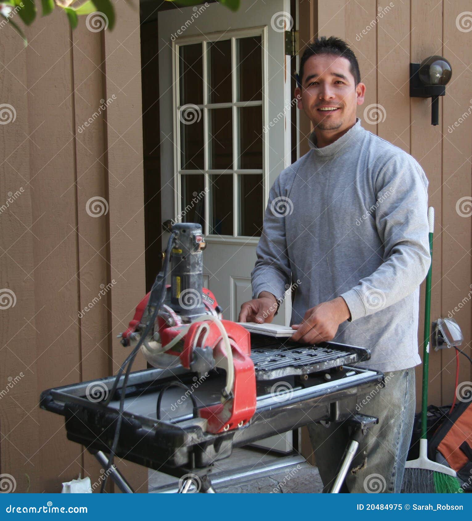 Contractor Cutting Laminate Kitchen Formica Counter Top. Focus On Saw ...