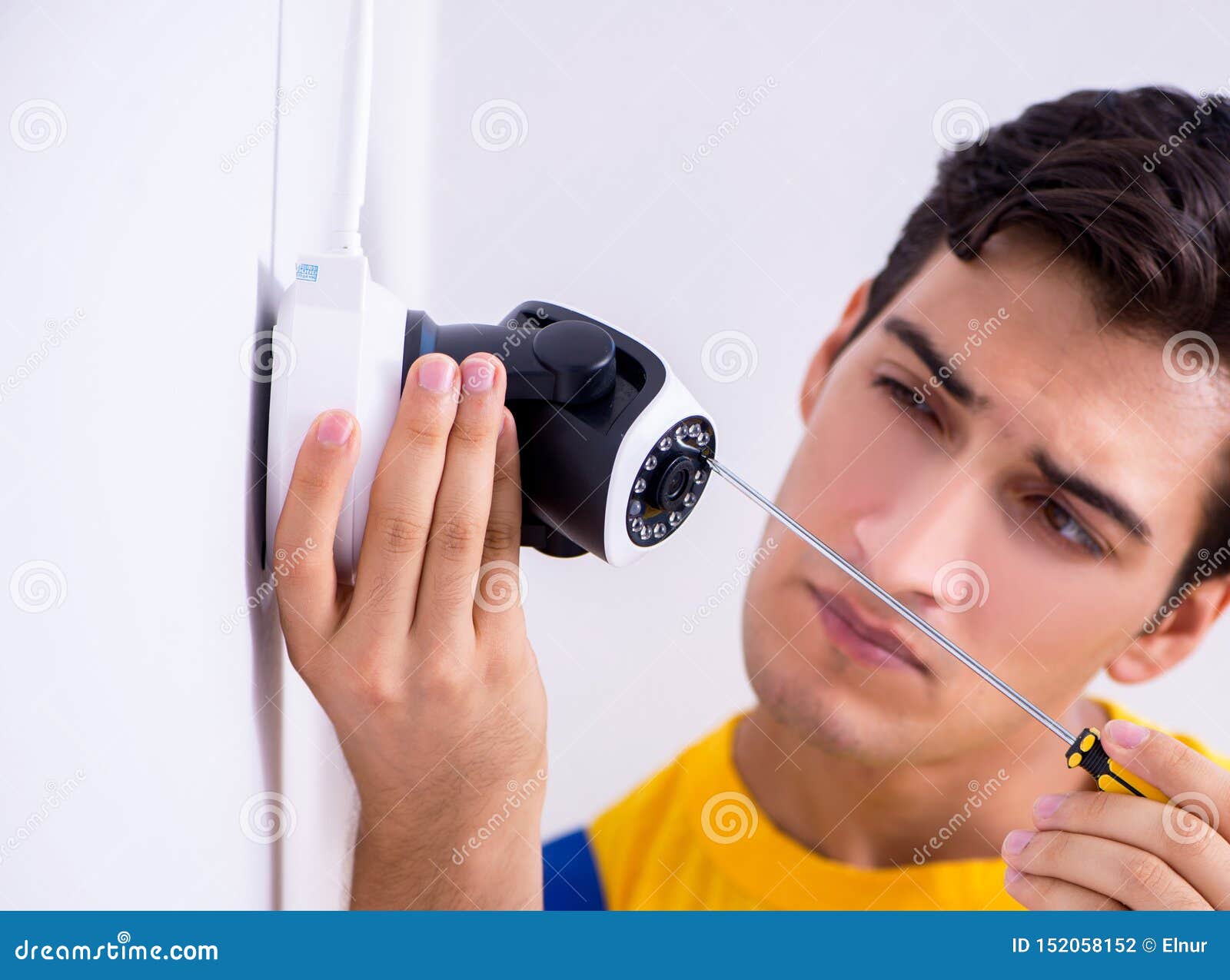 Contractor Installing Surveillance CCTV Cameras in Office Stock Photo ...