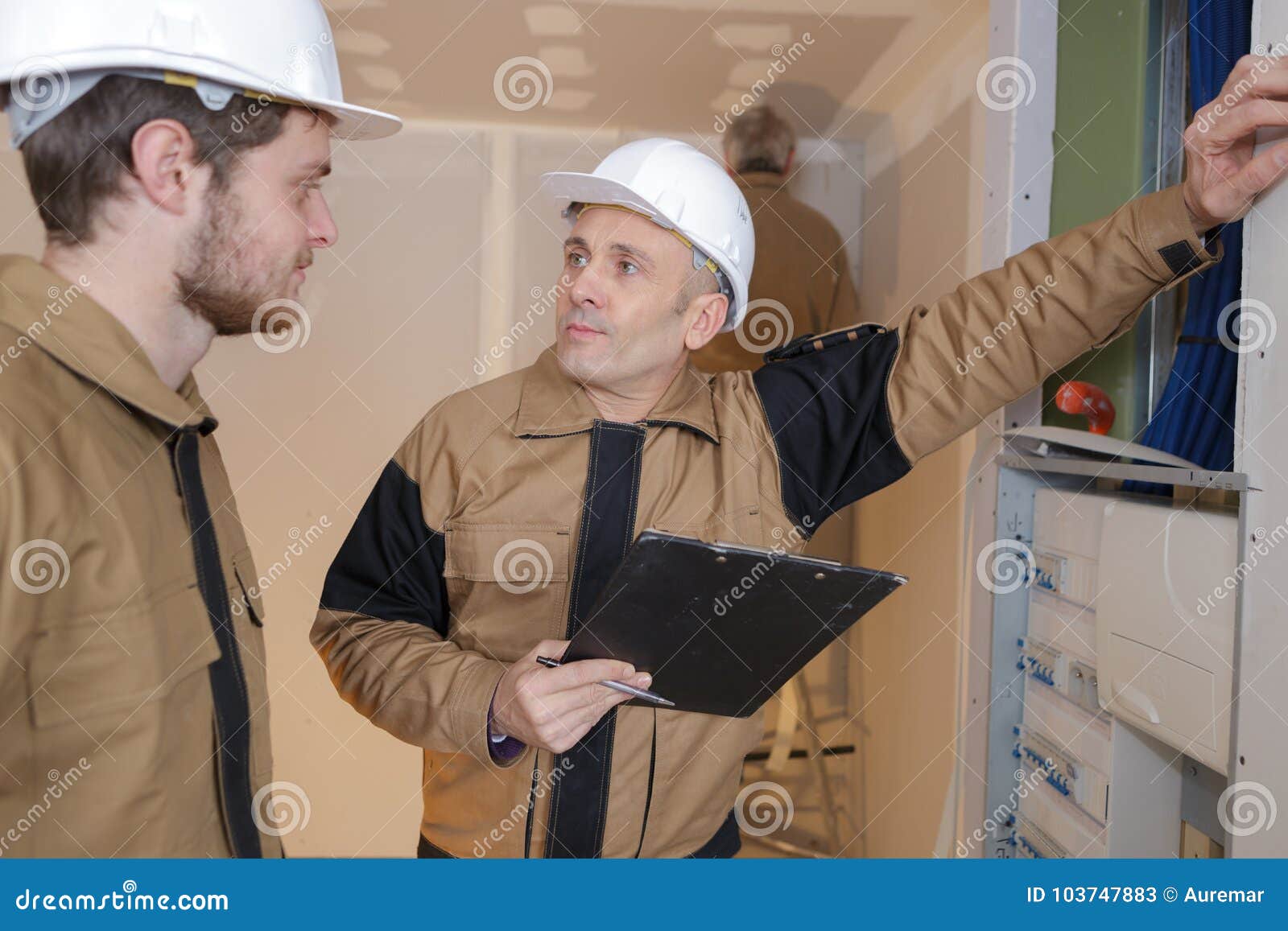 Contractor Manager Talking To Apprentice Stock Image - Image of builder ...