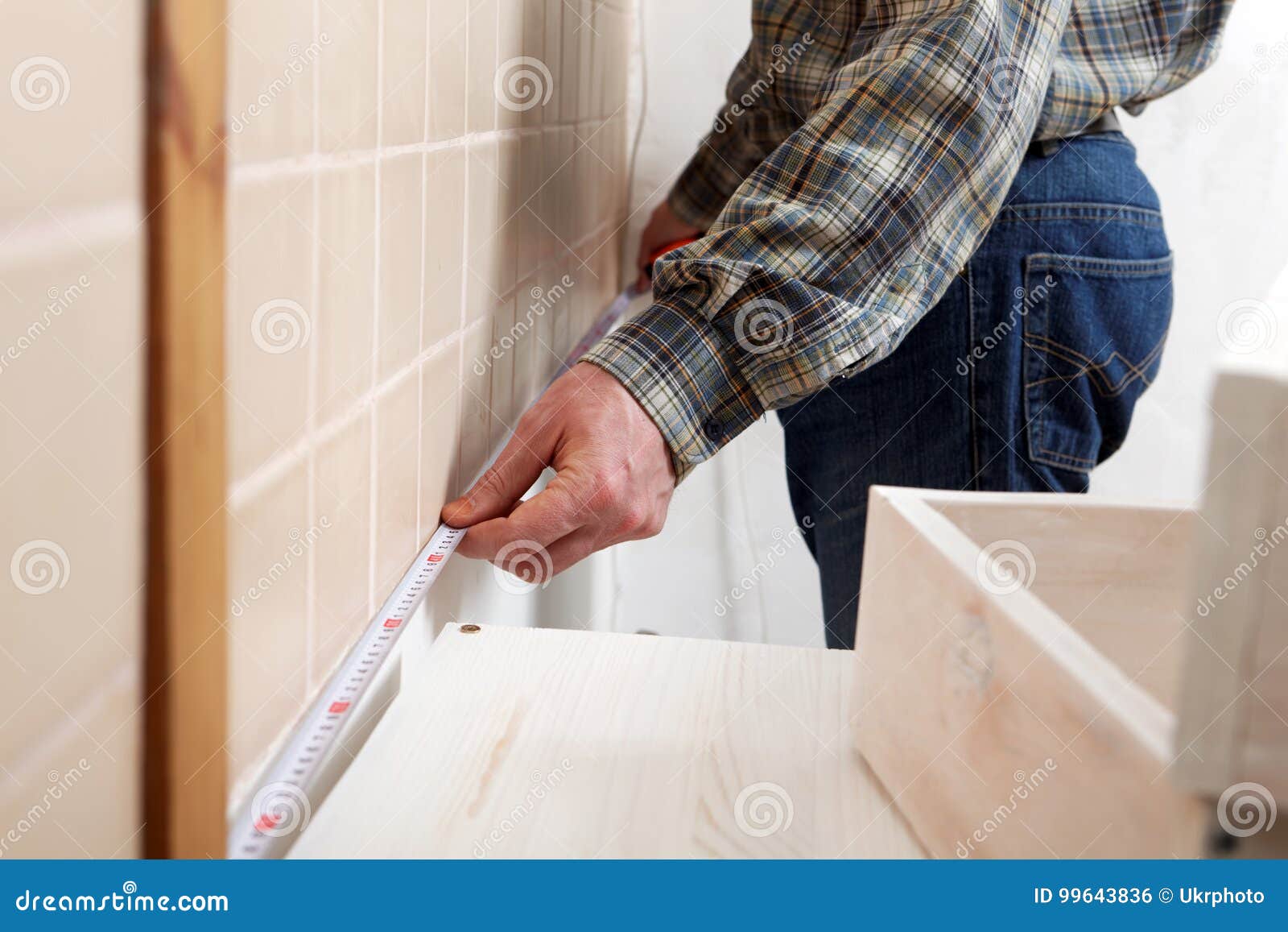 Contractor Measuring a Kitchen Stock Photo - Image of adult, indoors ...