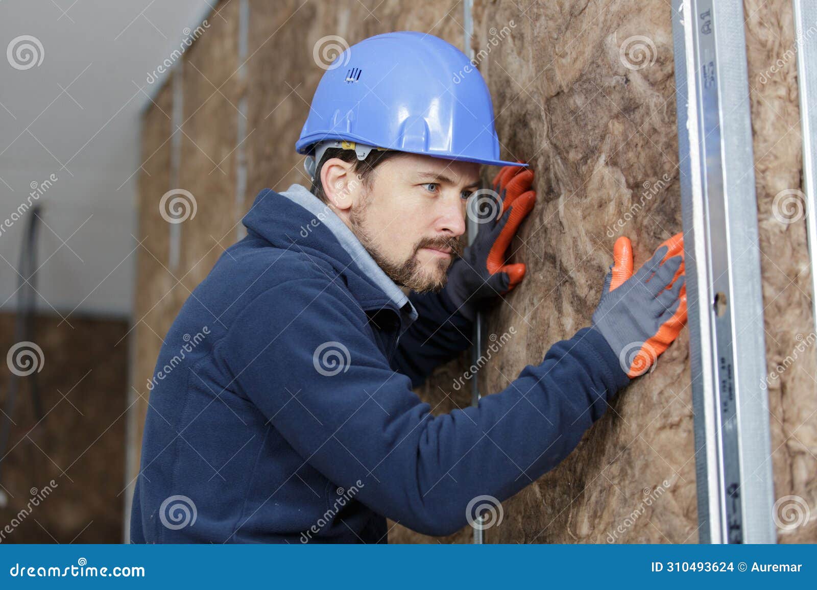Contractor Packing Insulation Cladding into Wall Stock Photo - Image of ...