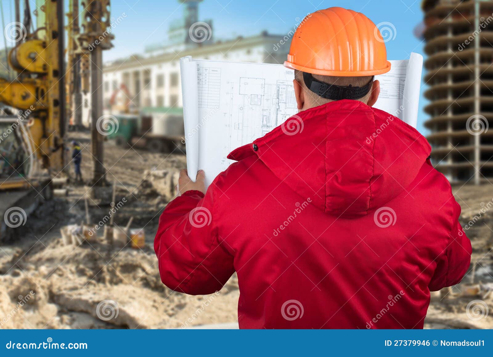 Contractor reading plans stock photo. Image of manual - 27379946