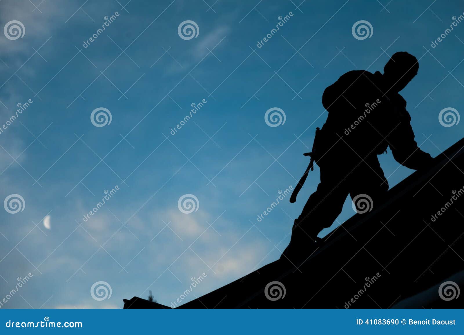Contractor in Silhouette Working on a Roof Top Stock Photo - Image of ...