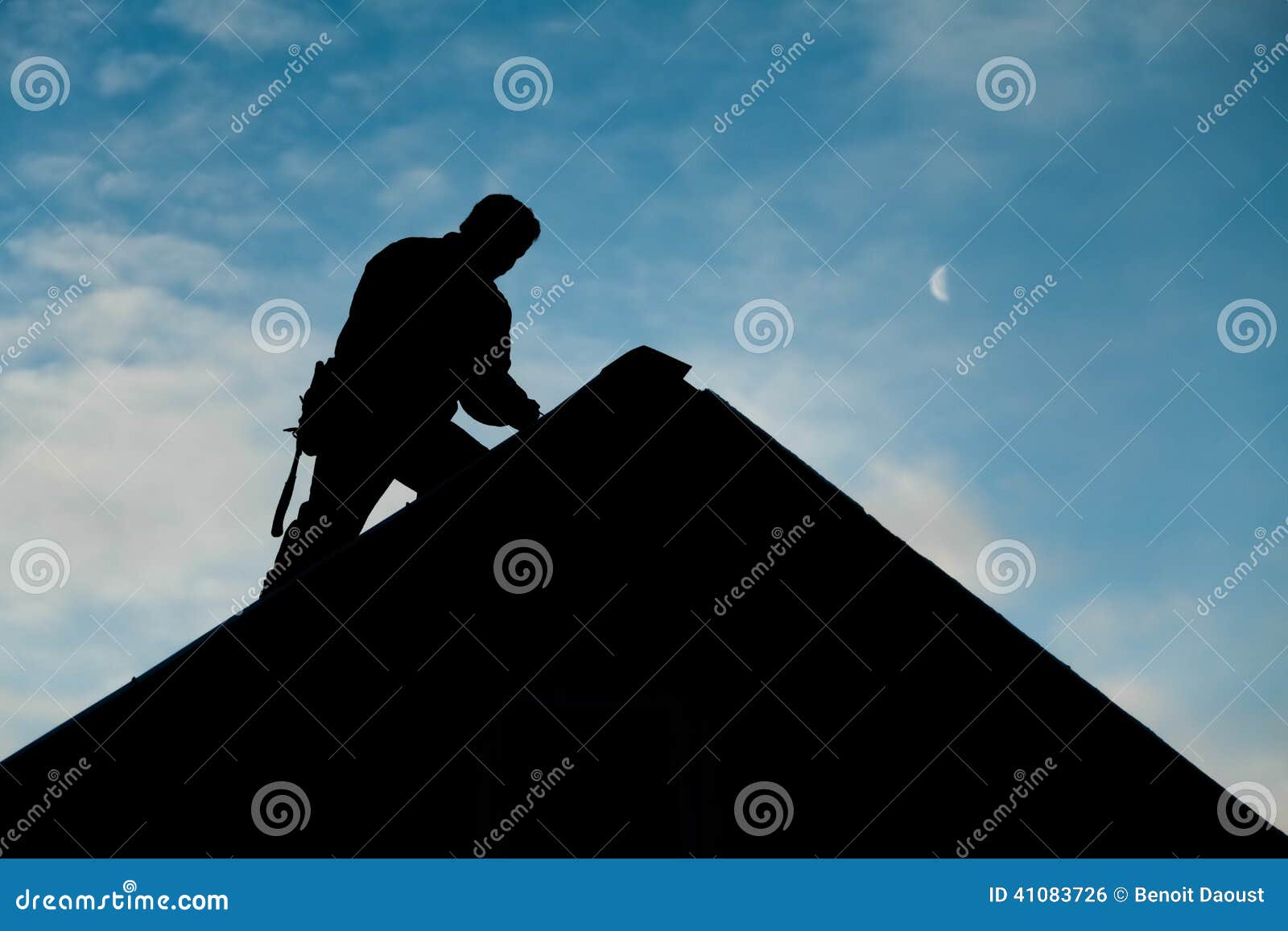 Contractor in Silhouette Working on a Roof Top Stock Photo - Image of ...