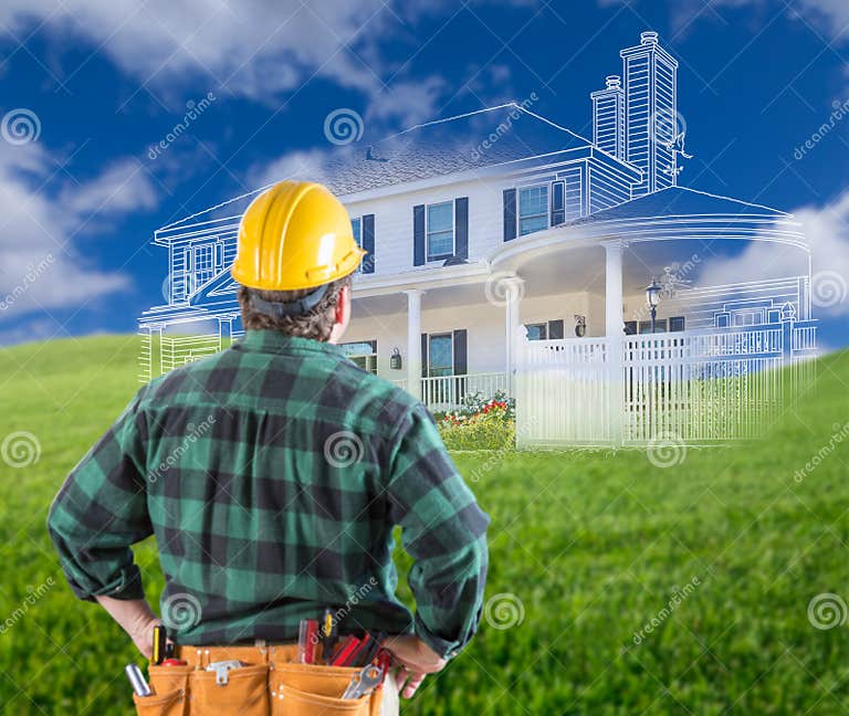 Contractor Standing Outdoors Looking Over Grass Site with Ghosted House ...
