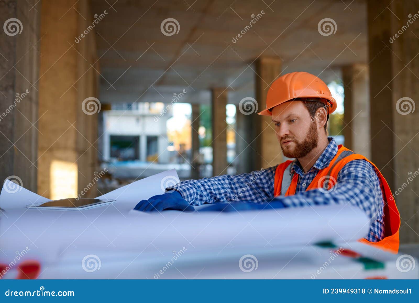 Contractor Using Digital Tablet at Construction Site Stock Photo ...