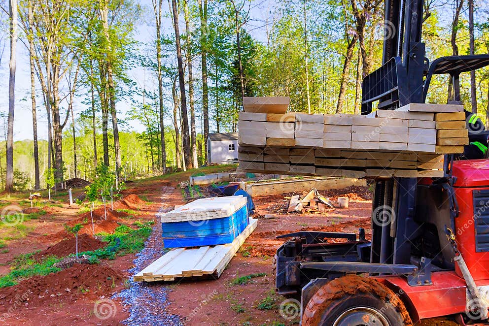 Contractor Using Forklift Working on Delivery Construction of Building ...