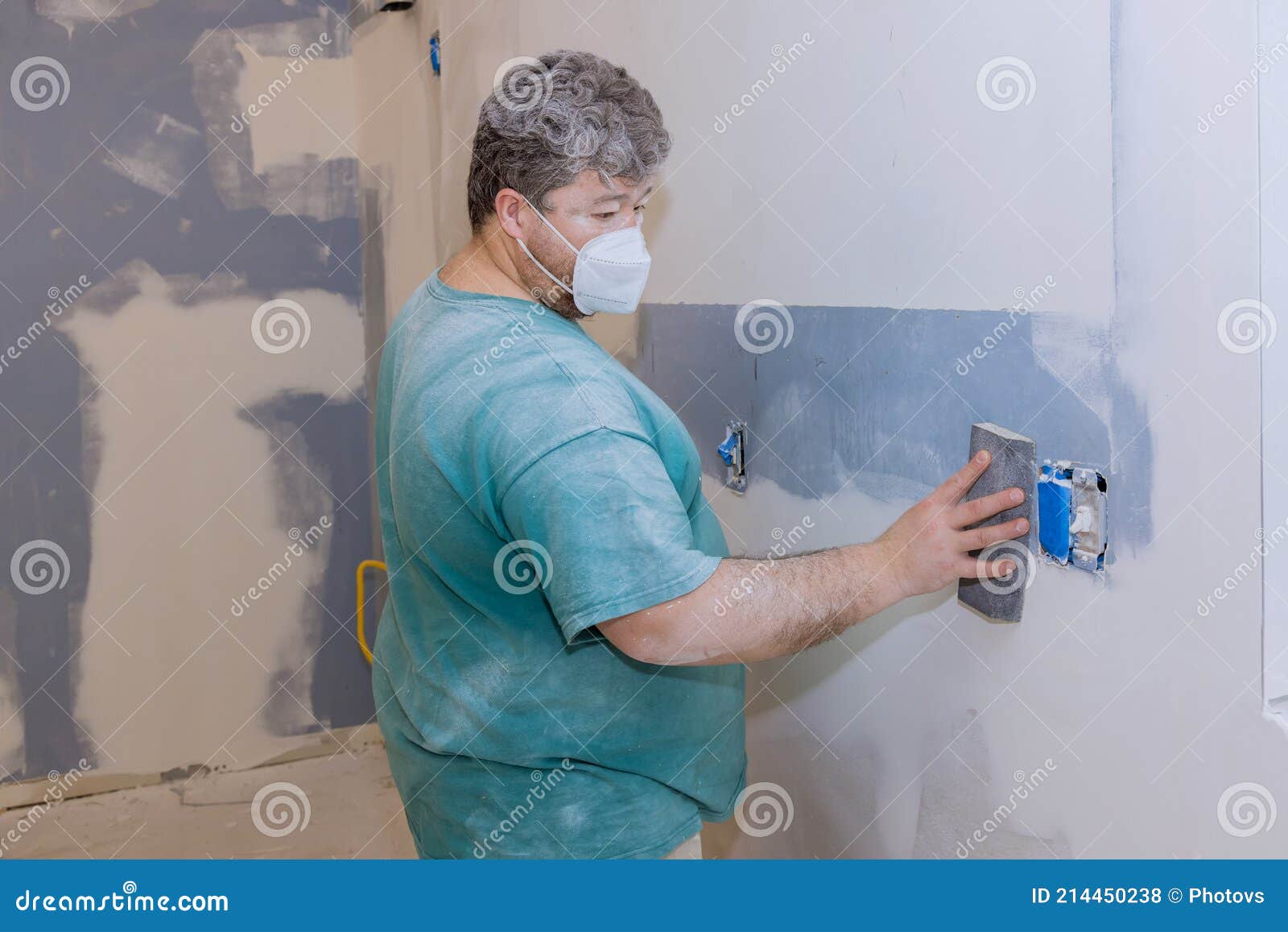 Contractor Using Sand Trowel Sanding the Drywall Stock Photo - Image of ...