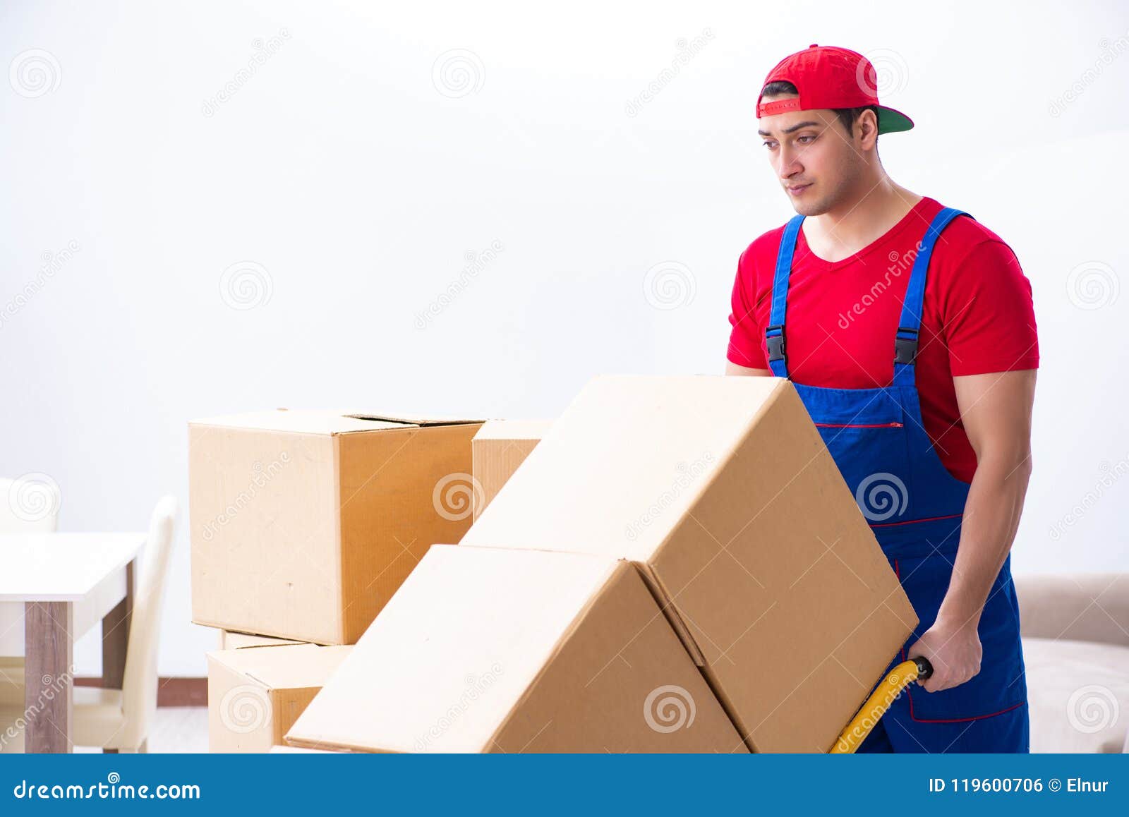 The Contractor Worker Moving Boxes during Office Move Stock Photo ...