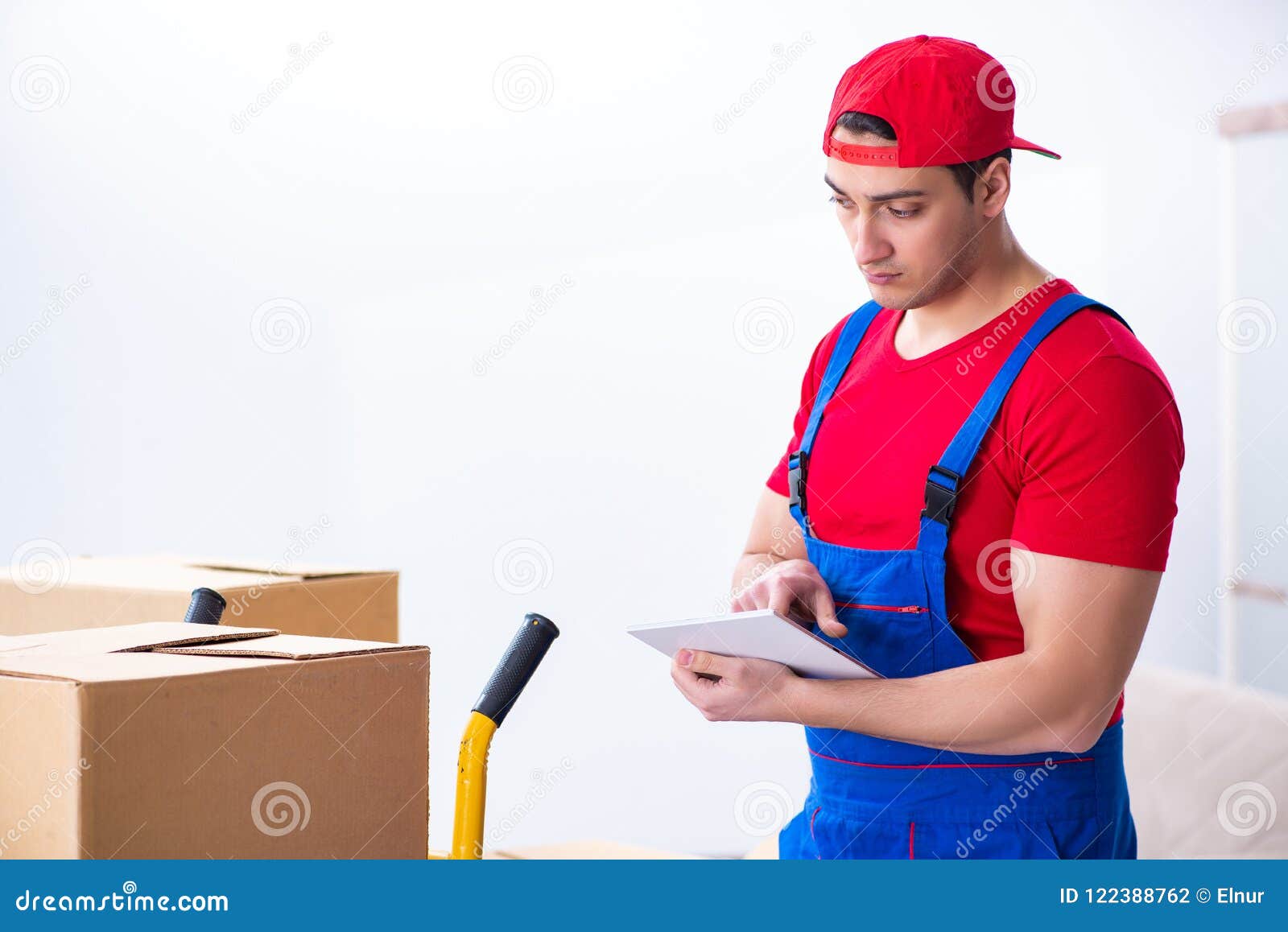 The Contractor Worker Moving Boxes during Office Move Stock Photo ...