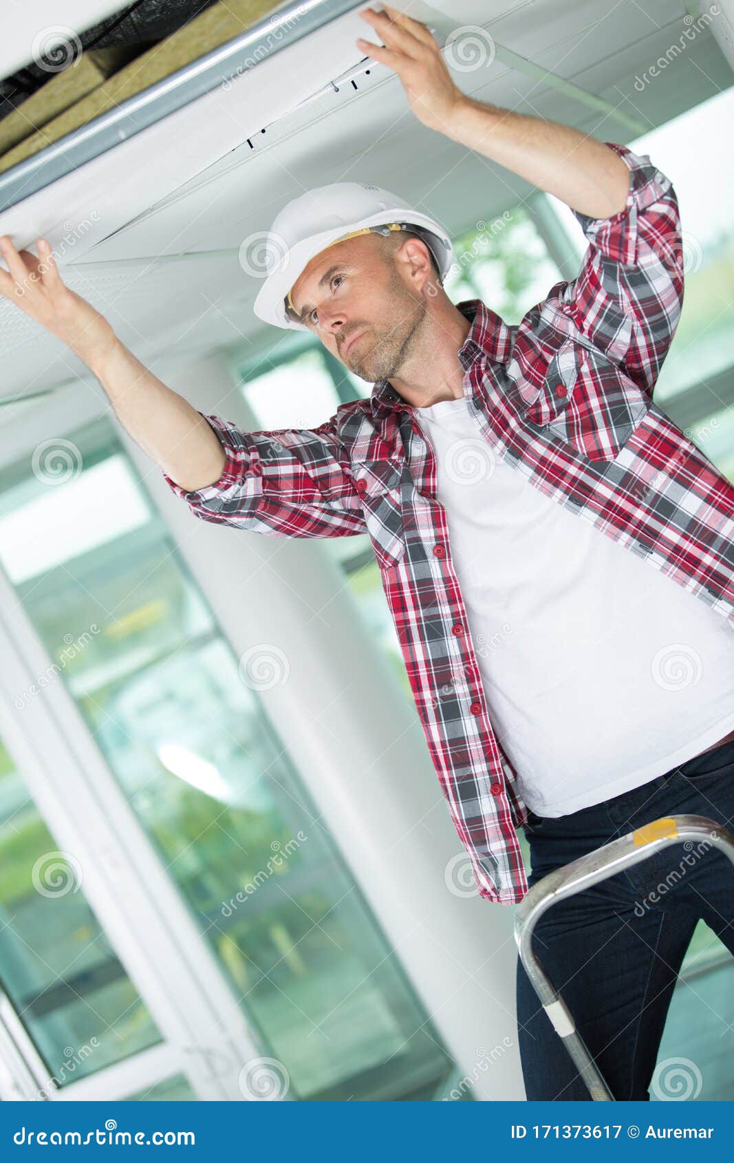 Contractor Working on Overhead Ceiling Panel Stock Image - Image of ...