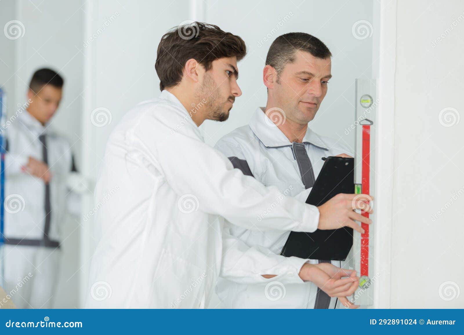 Contractors Checking Wall Angles Stock Photo - Image of person ...