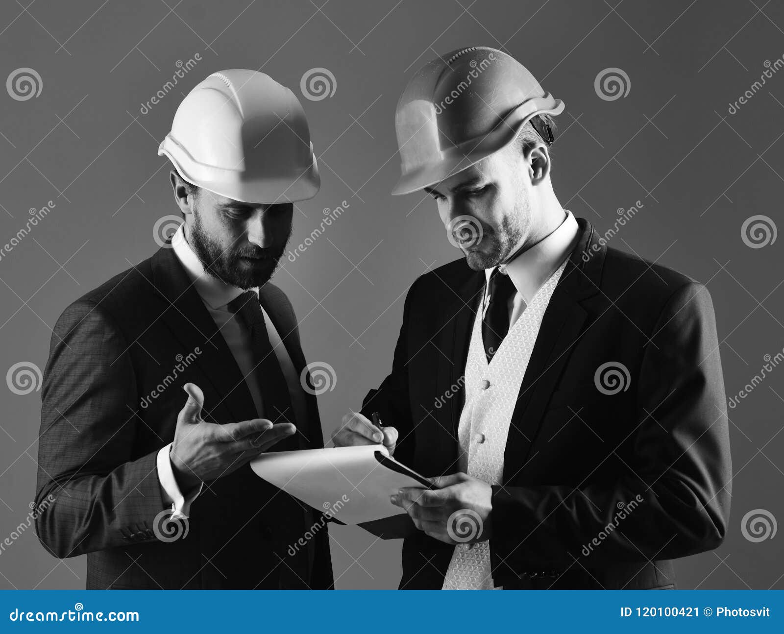Contractors Look at Building Plan. Architects with Serious Faces ...