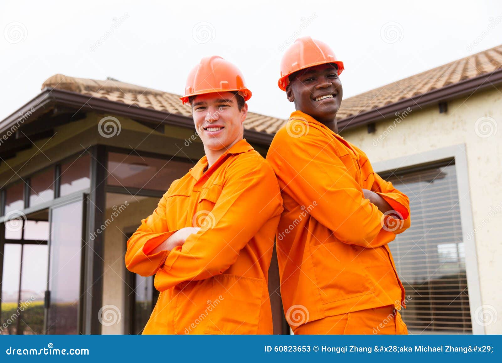 Contractors standing house stock image. Image of colleagues - 60823653