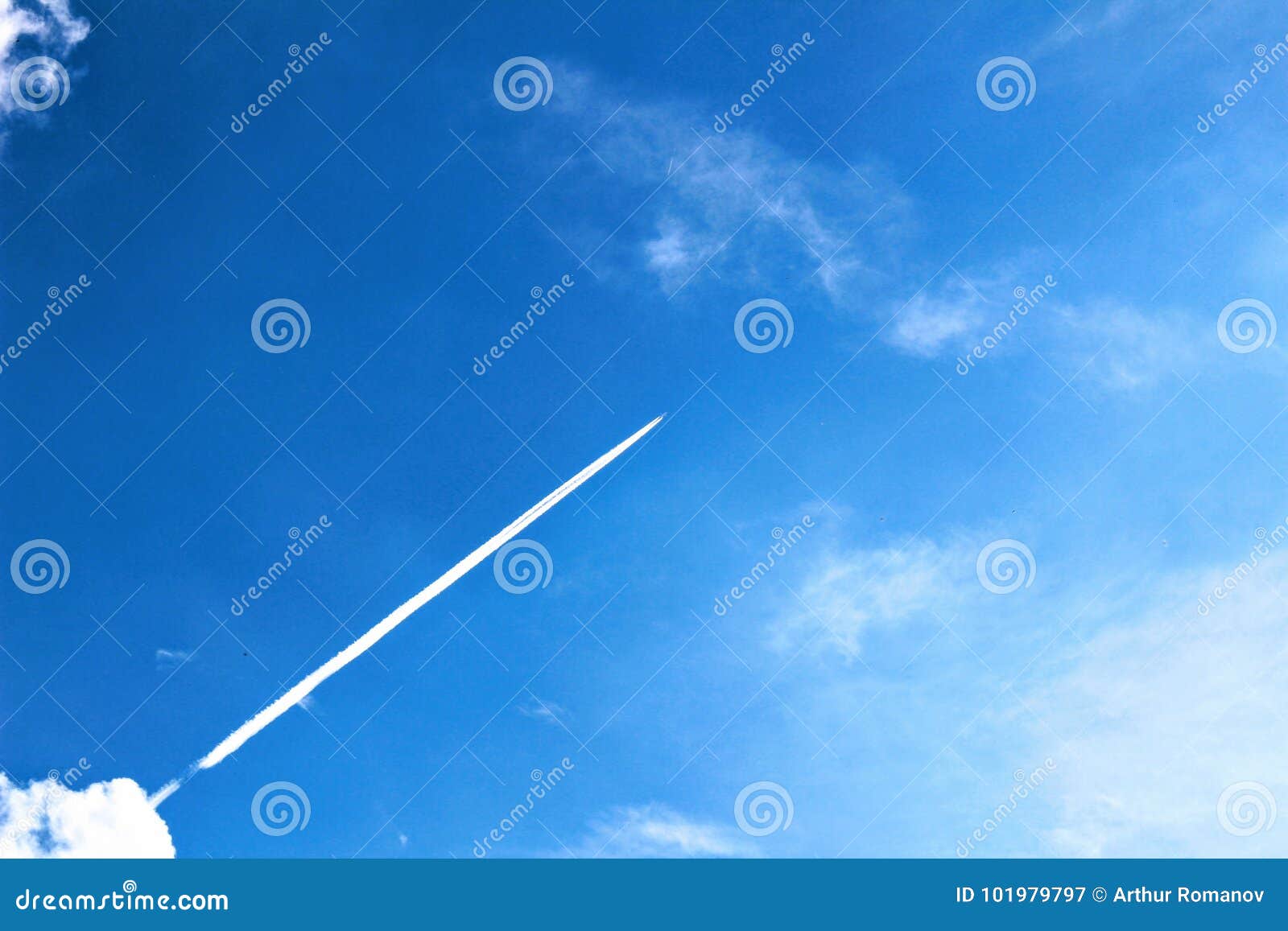 Contrail from an Airplane Flying Over a Clear Blue Sky Stock Image ...