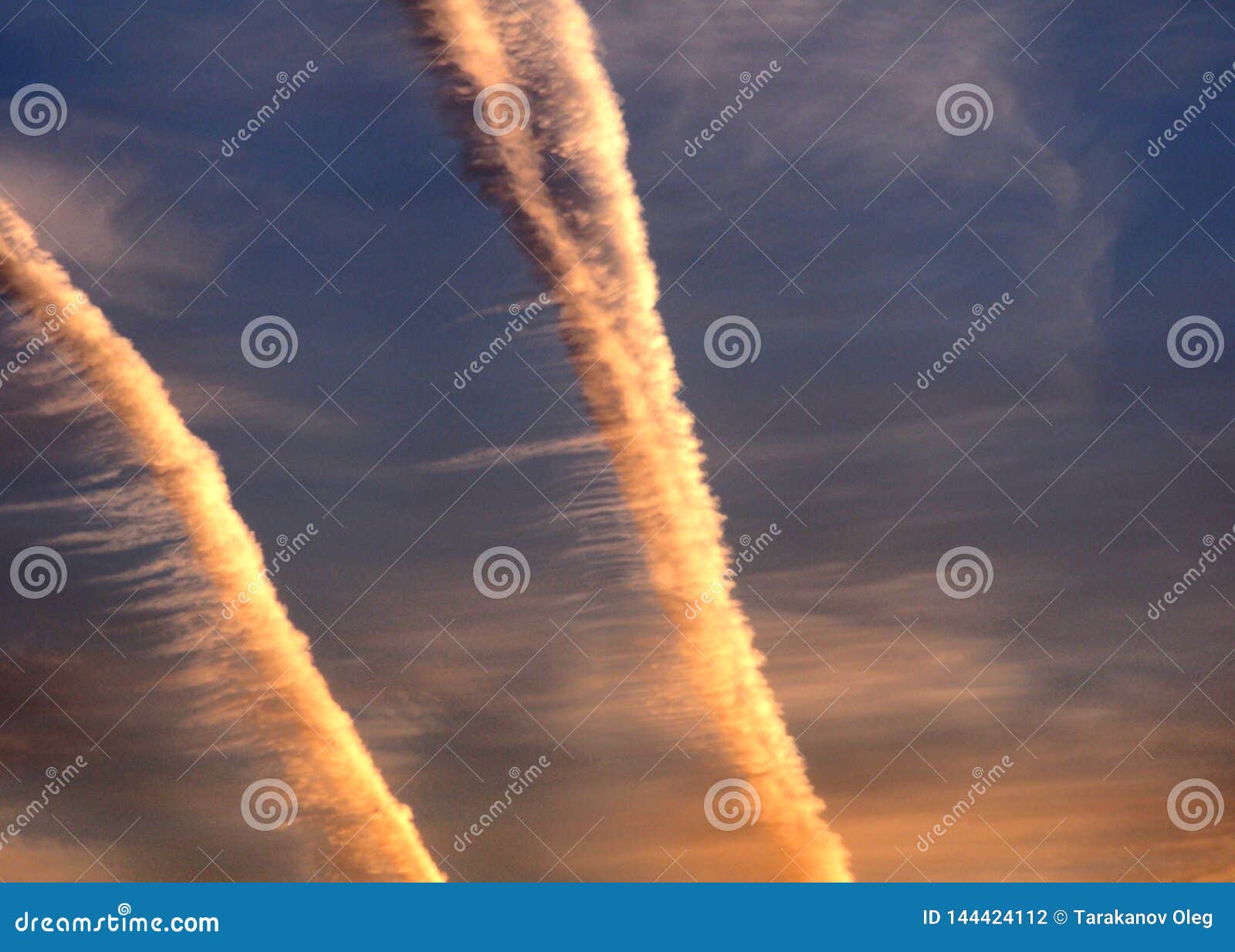 Contrails from a Jet Plane in the Sky Stock Photo - Image of reflection ...