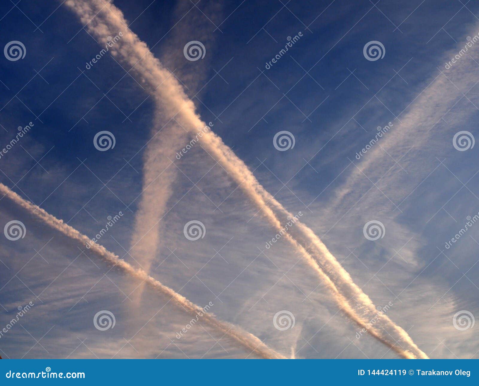 Contrails from a Jet Plane in the Sky Stock Image - Image of sunny ...