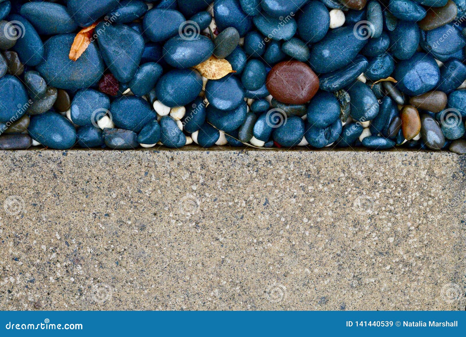 Contrast Textures of a Paved Driveway and Pebbled Sidewalk. Background ...