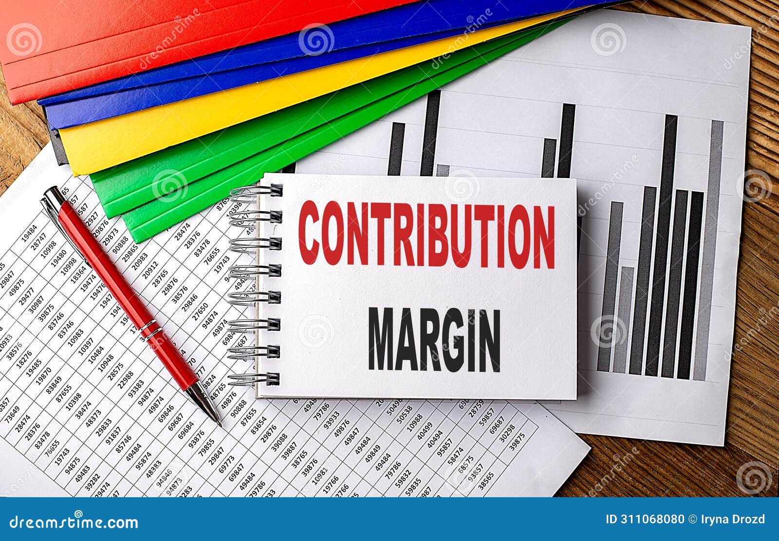 CONTRIBUTION MARGIN Text on Notebook with Folder on Chart Stock Photo ...